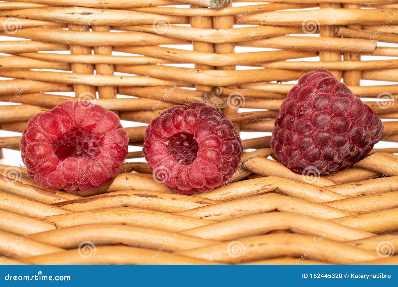 Fresh Crimson Raspberry with Braided Rattan Stock Photo - Image of ...