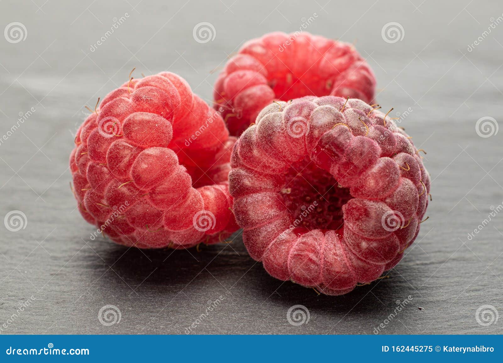 Fresh Crimson Raspberry on Grey Stone Stock Image - Image of mature ...