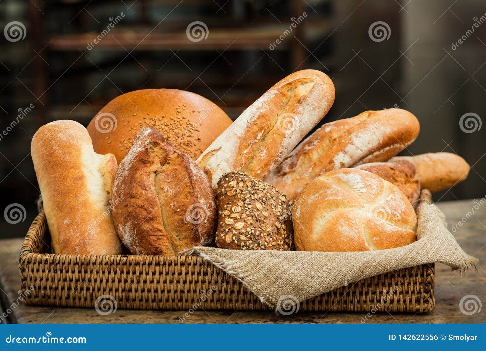 Fresh Crunchy Bread Assortment in a Cozy Wicker Basket Stock Photo ...