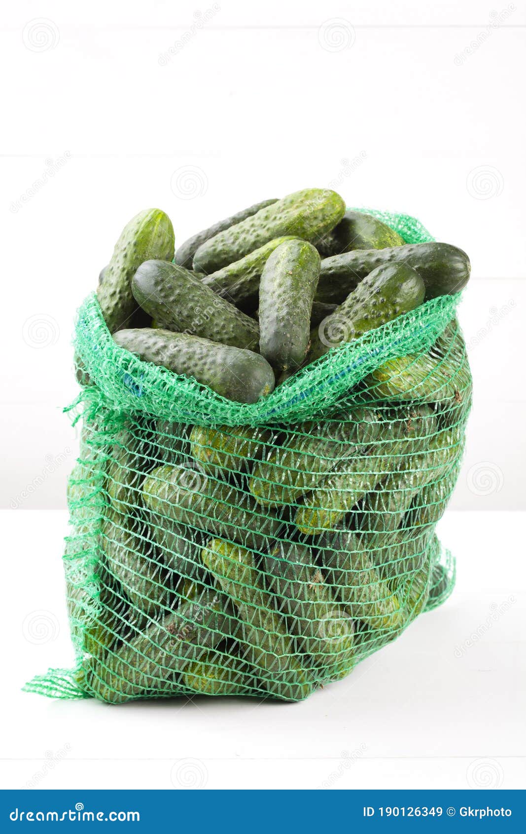 Bag of fresh cucumbers stock image. Image of color, object - 190126349