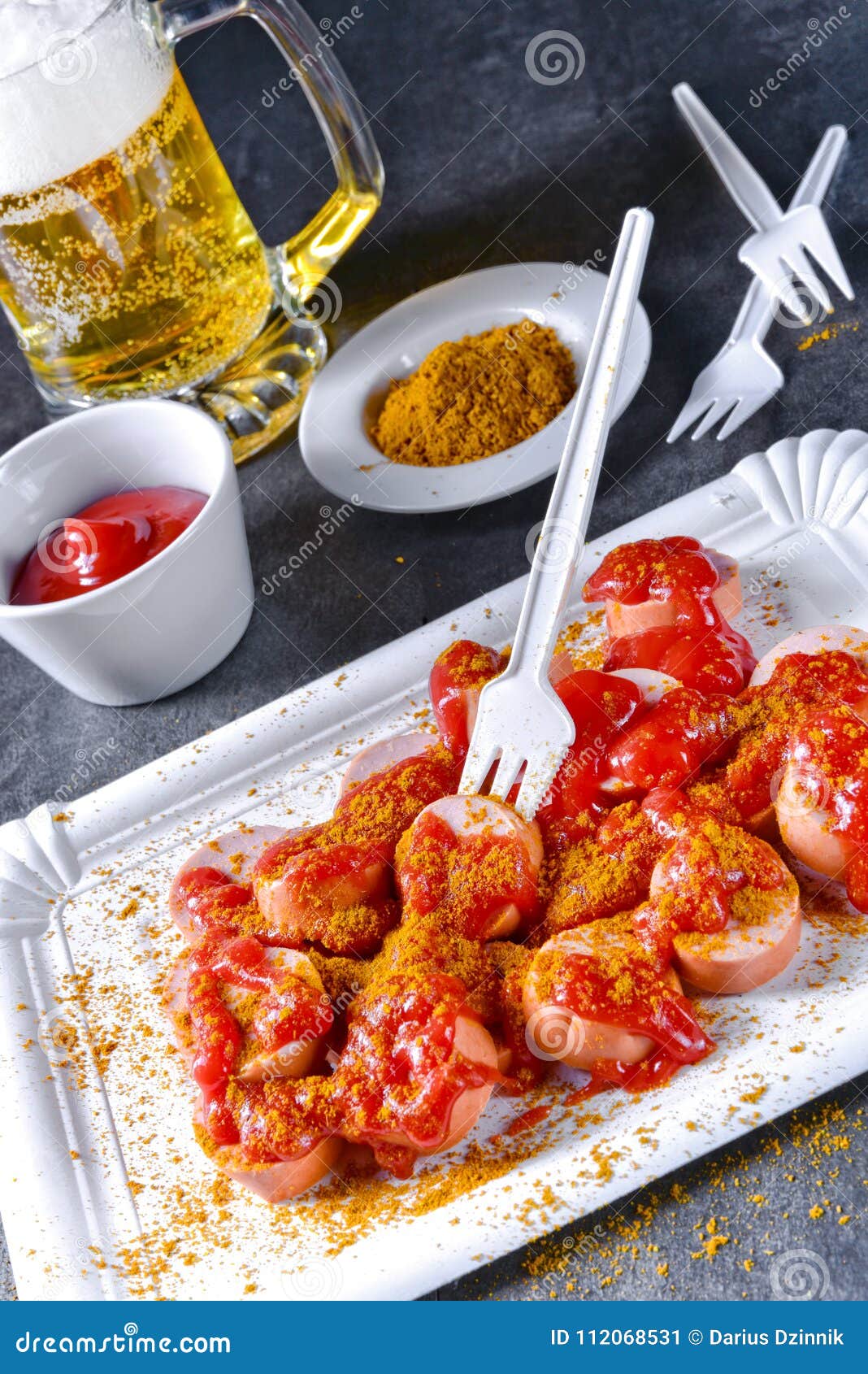Curry bockwurst with beer stock image. Image of bread - 112068531