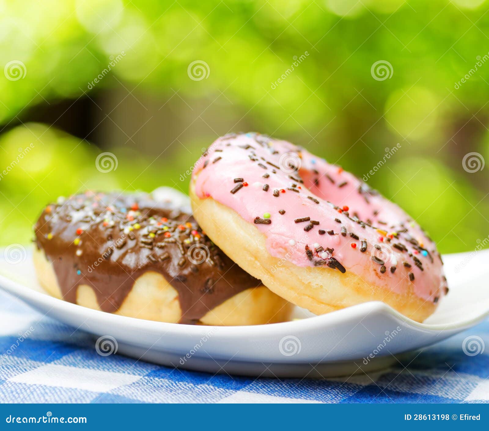 Fresh Donuts on Nature Background Stock Photo - Image of doughnut ...