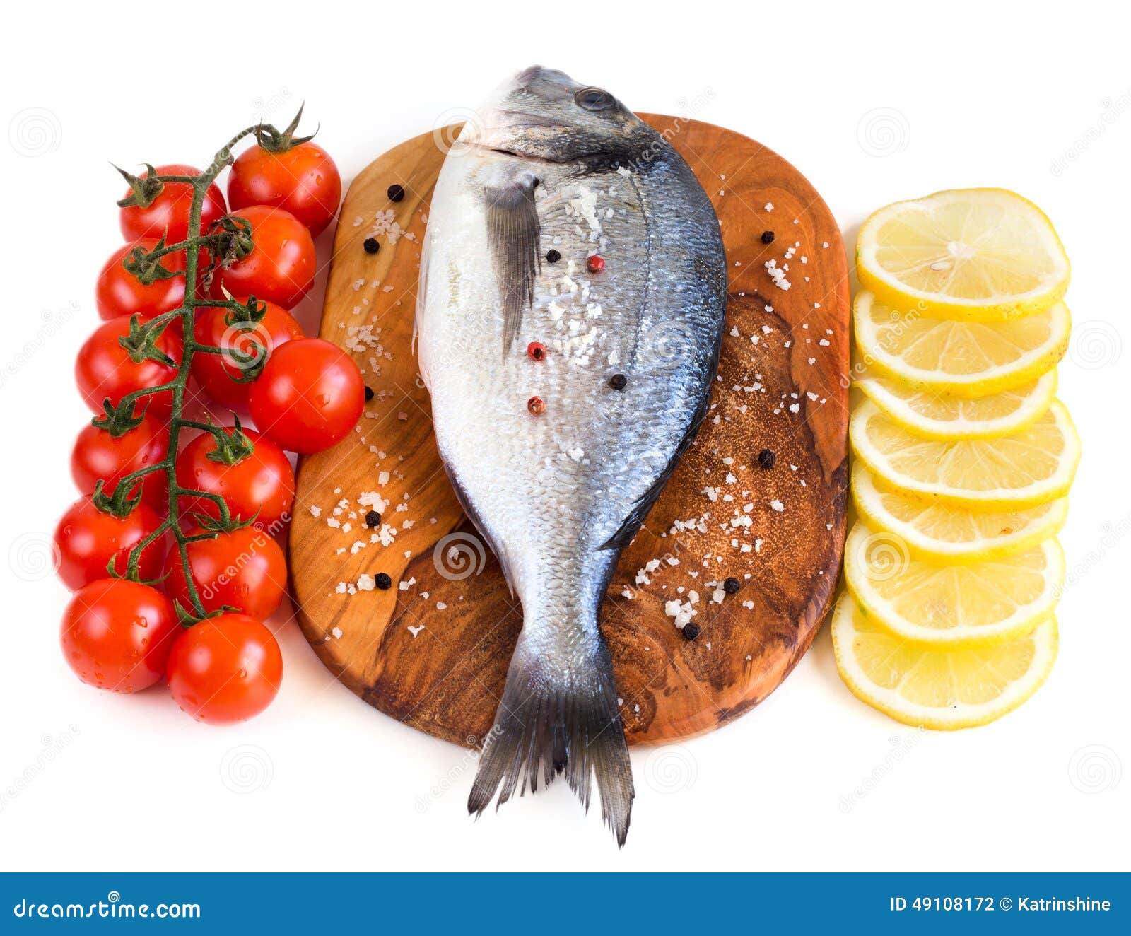 Fresh Dorado Fish, Lemon and Tomatoes Stock Photo - Image of meal ...