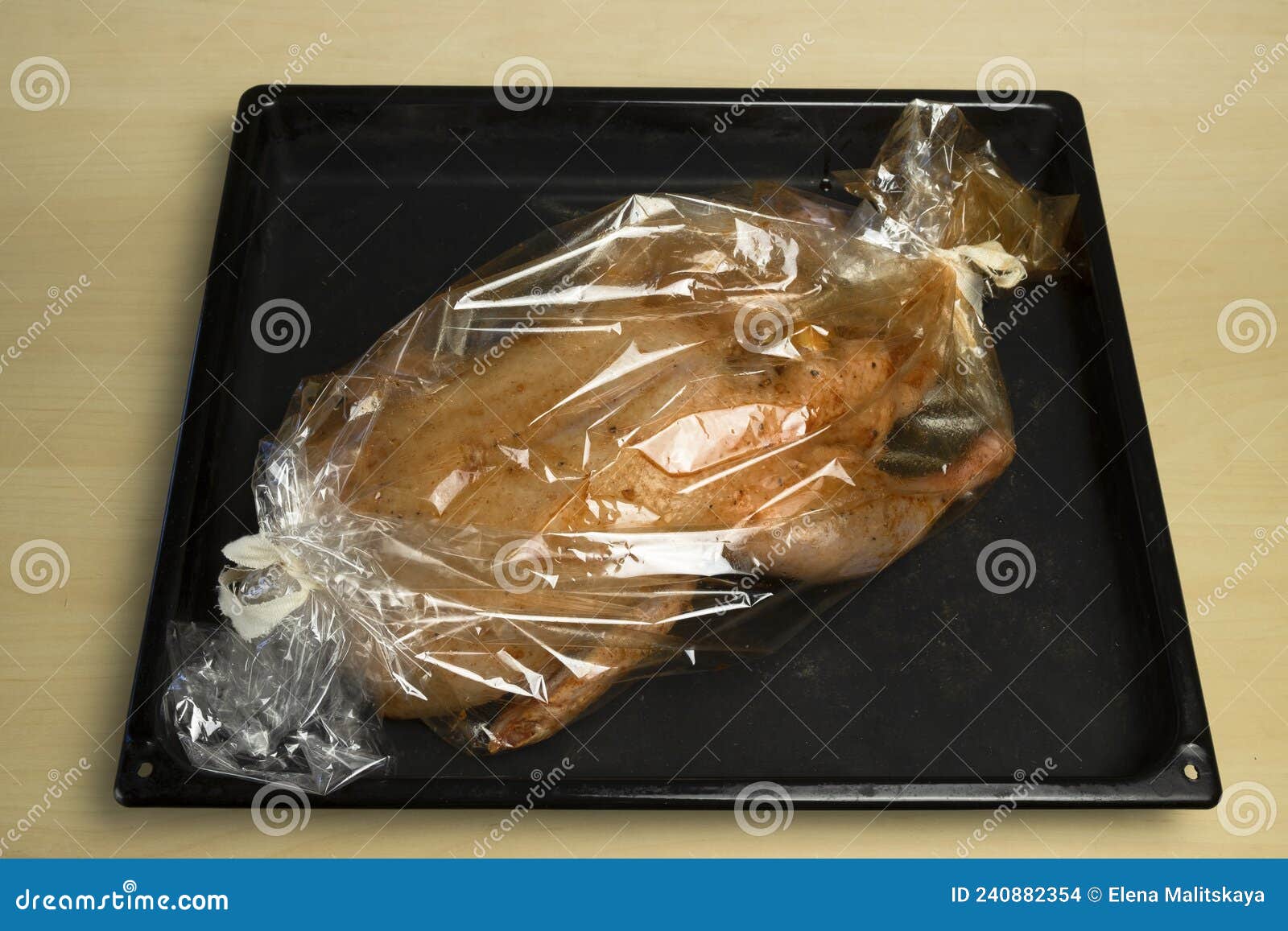 Fresh Duck Carcass in a Polyethylene Sleeve is Ready for Baking in the ...