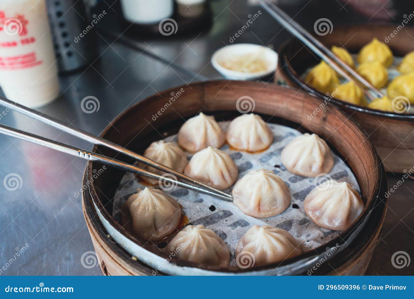 Fresh Dumplings with the Sticks in Traditional Bamboo Plate Stock Photo ...