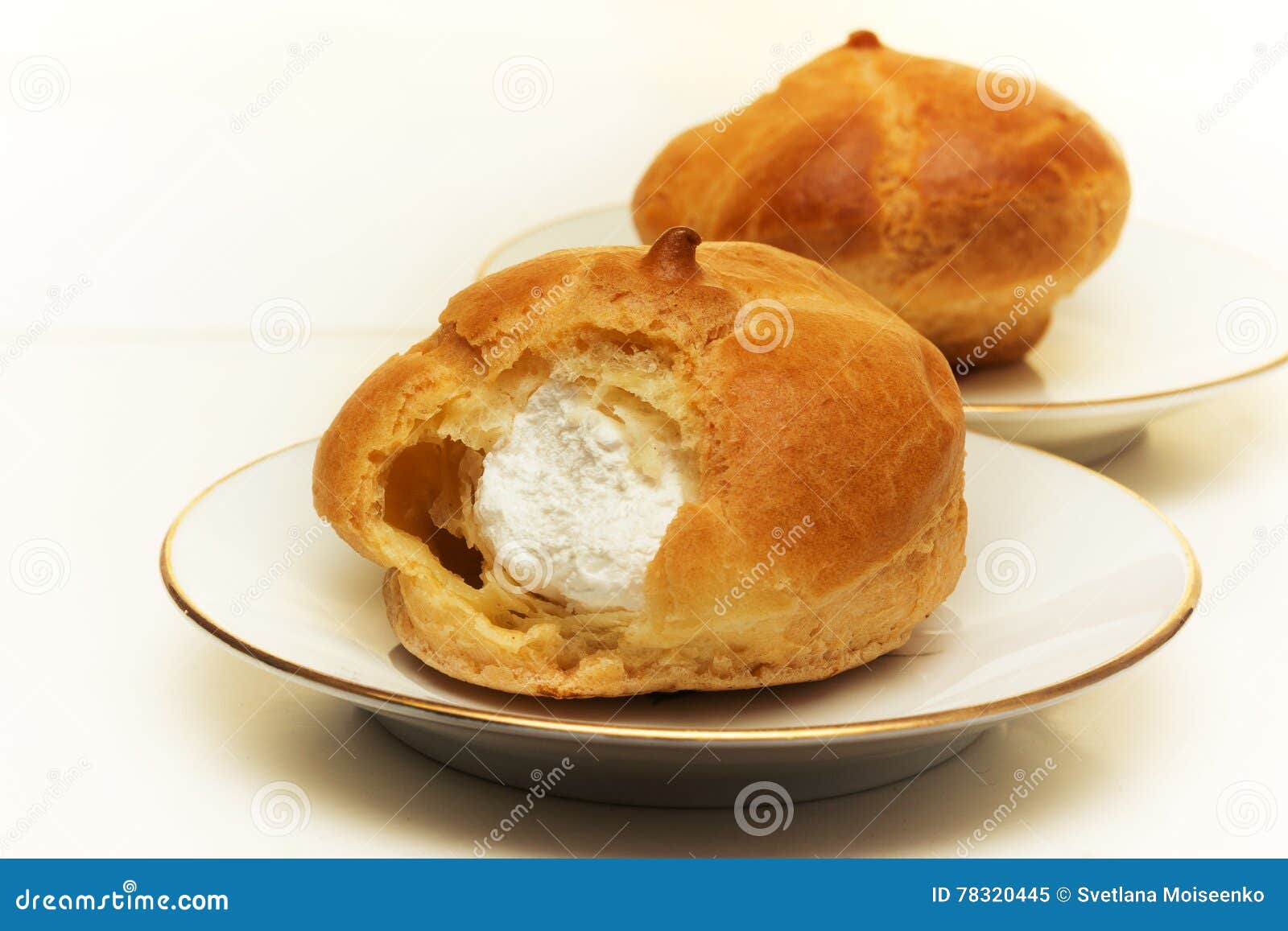 Fresh Eclair with Cream on a Plate, Close Up Stock Image - Image of ...