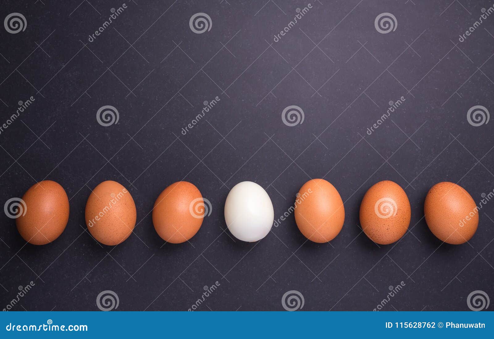 Fresh Egg and Boiled Egg without Shell. Top View on Black Stone Stock ...