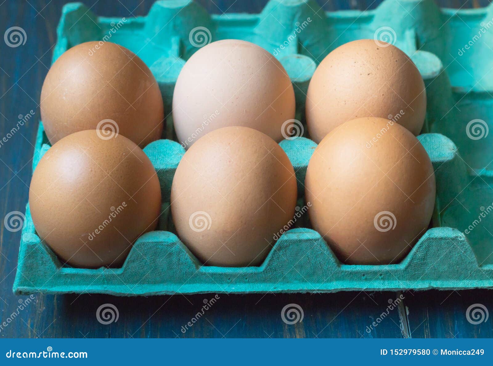 Fresh Eggs on Cyan Cardboard Container Stock Photo - Image of concept ...