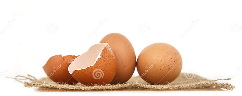 Fresh Eggs and Half of Eggshell on White Background Stock Photo - Image ...