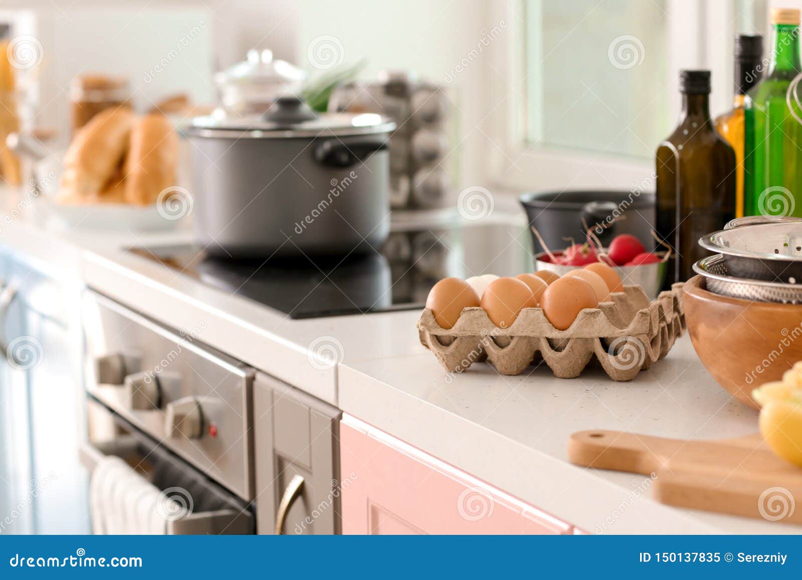 Fresh Eggs on Table in Modern Kitchen Stock Image - Image of kitchen ...