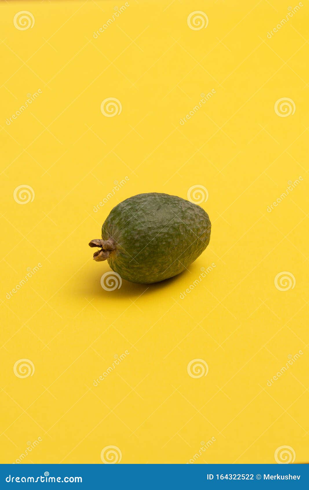 Fresh Feijoa Fruit on Bright Yellow Surface. Studio Close-up Shot ...
