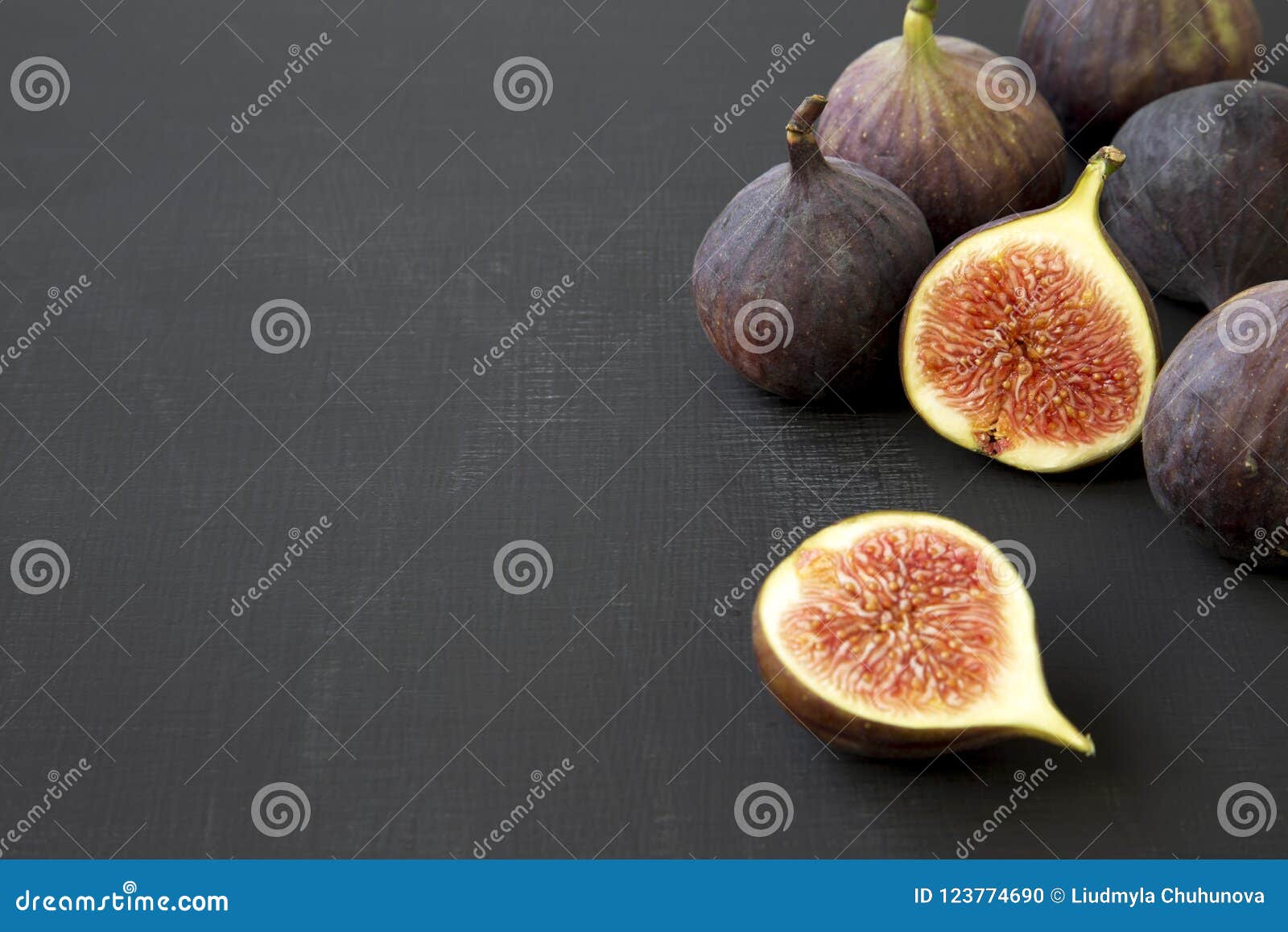 Fresh Figs on Dark Surface, Side View. Close-up Stock Photo - Image of ...