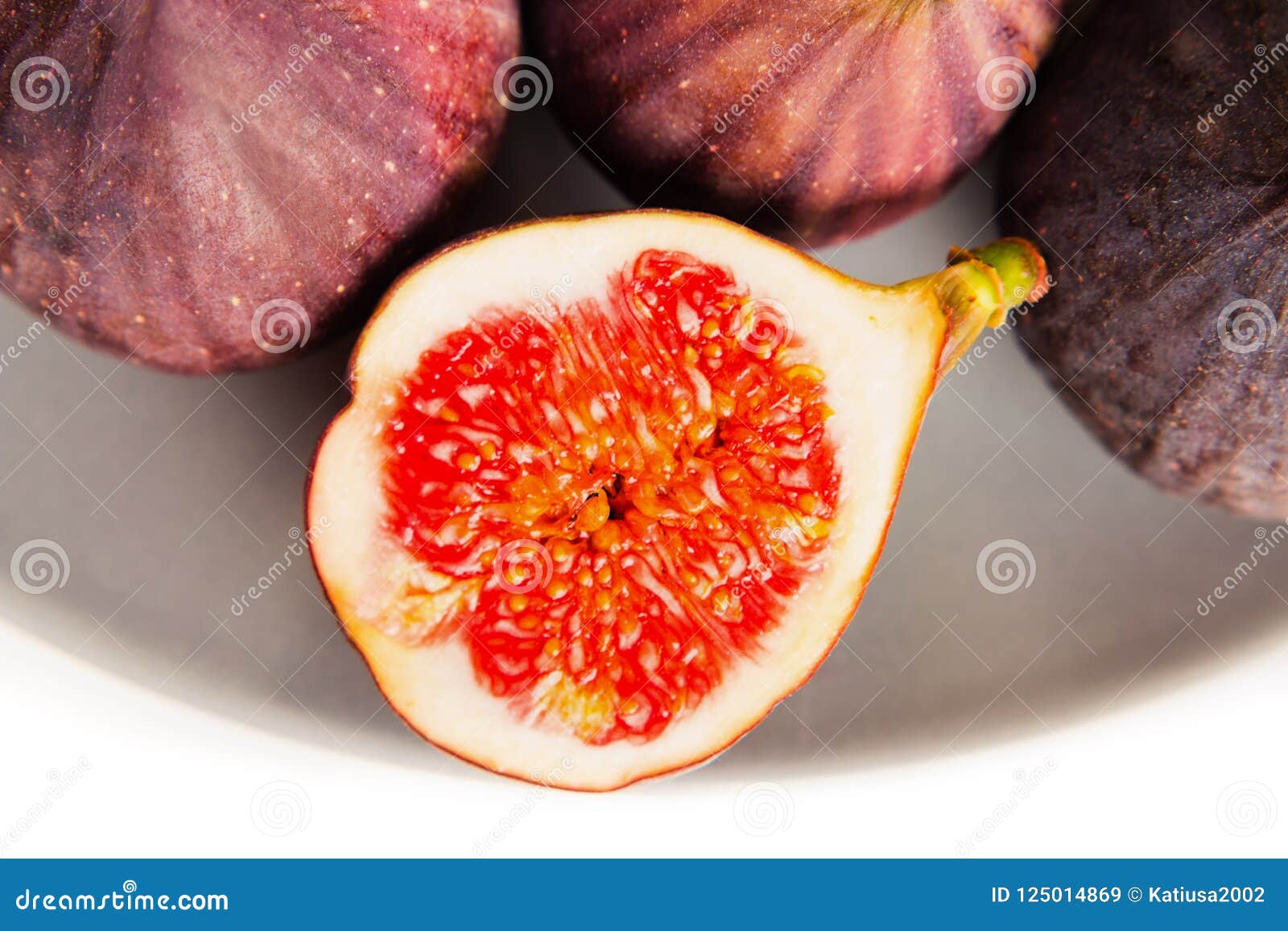 Fresh Figs on Grey Plate. Fruit with Half Isolated on White. Stock ...