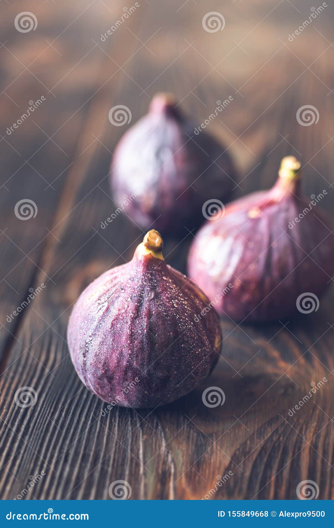 Fresh figs on the table stock photo. Image of gourmet - 155849668