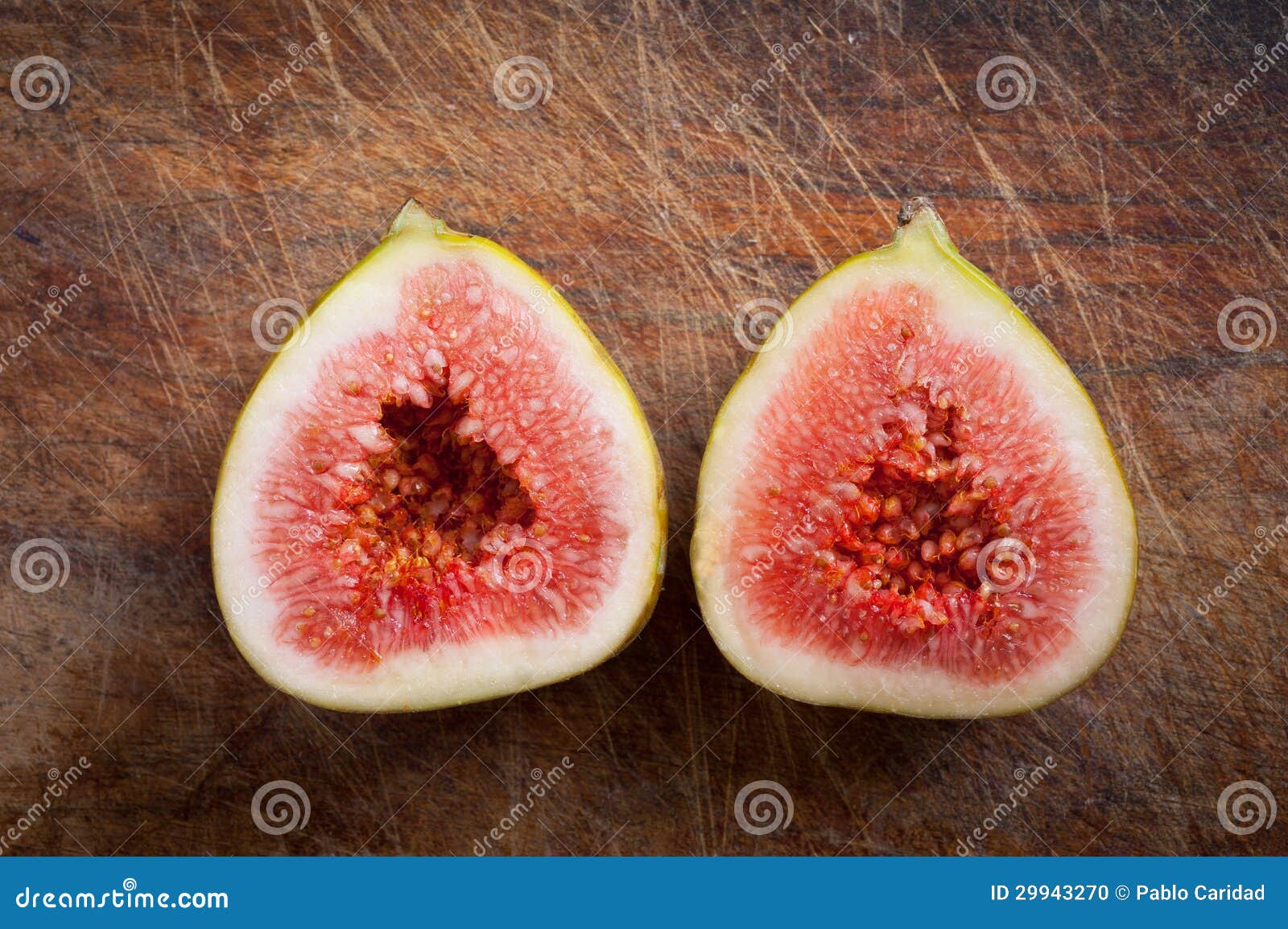 Fresh figs on wooden table stock photo. Image of sweet - 29943270