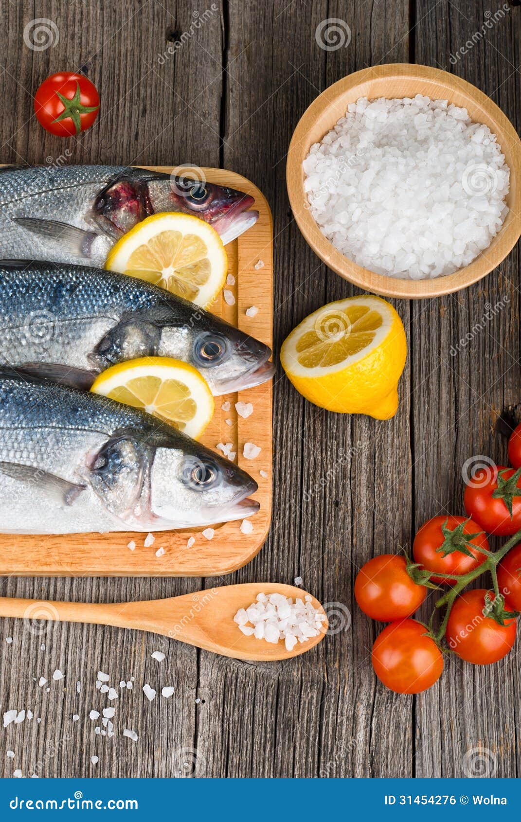 Fresh Fish on Chopping Board with Salt Stock Photo - Image of food ...