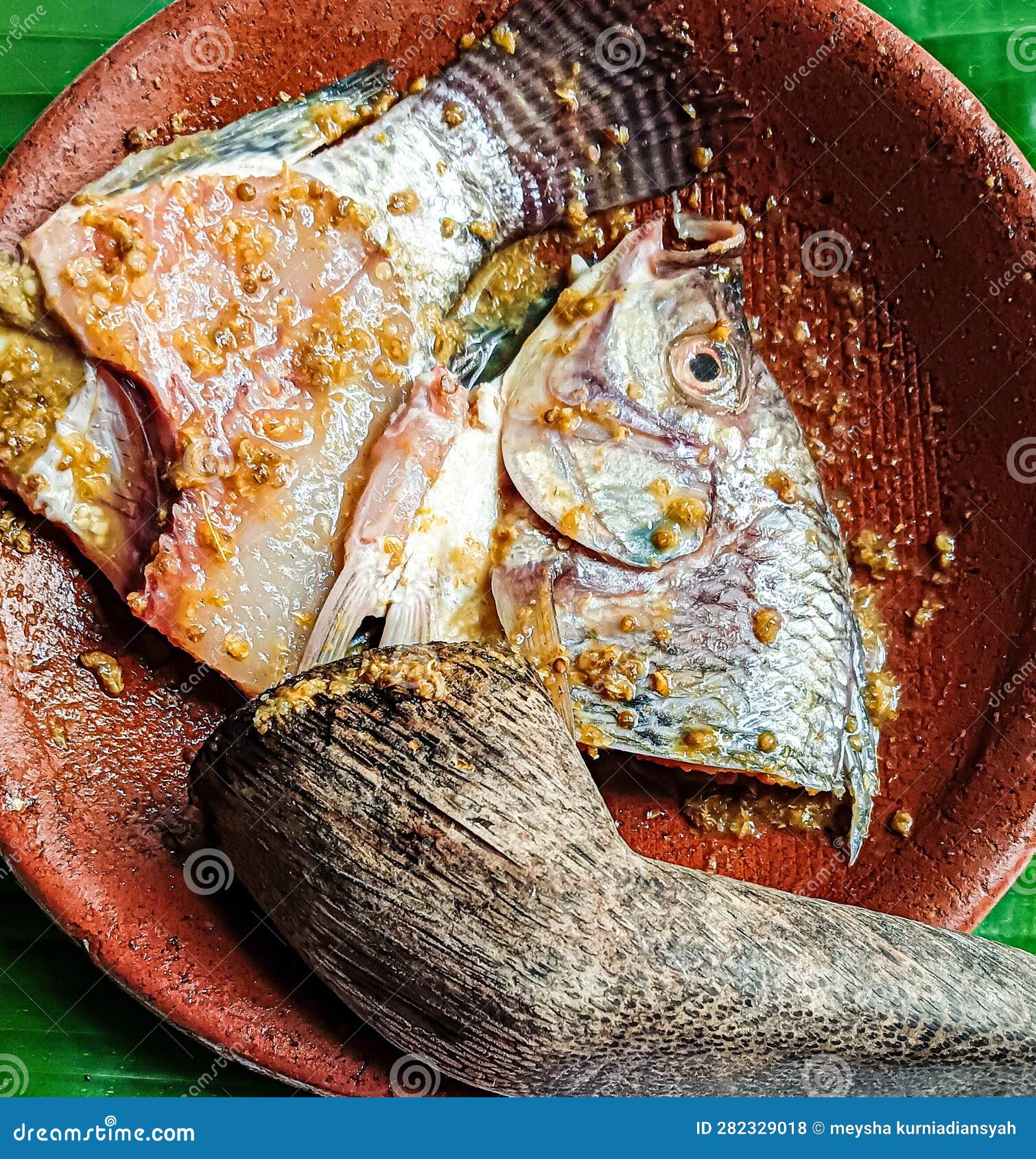 Fresh Fish with Mashed Spices Stock Photo - Image of fresh, fish: 282329018