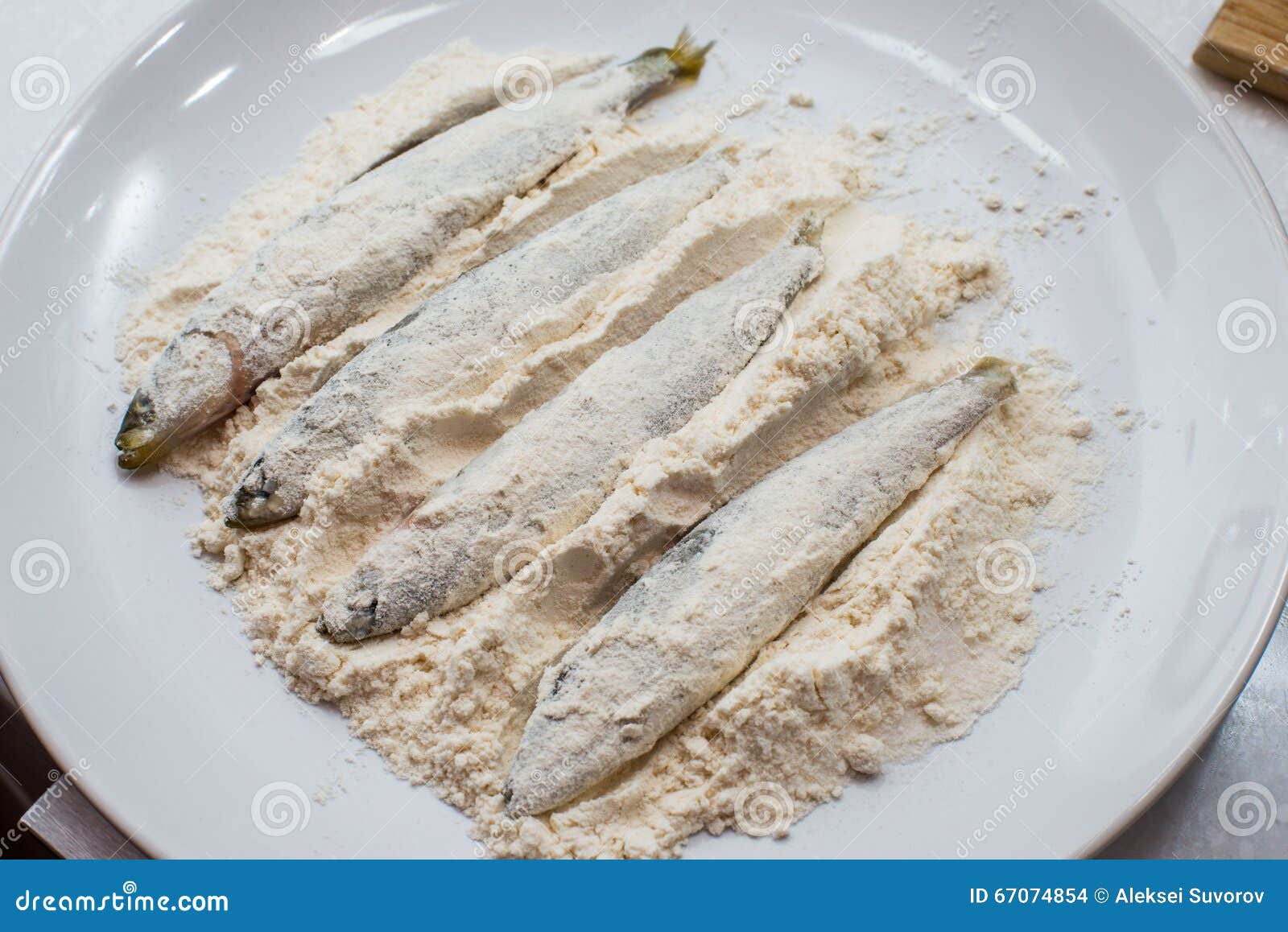 Fresh Fish in a Plate with Flour Stock Photo - Image of isolated ...