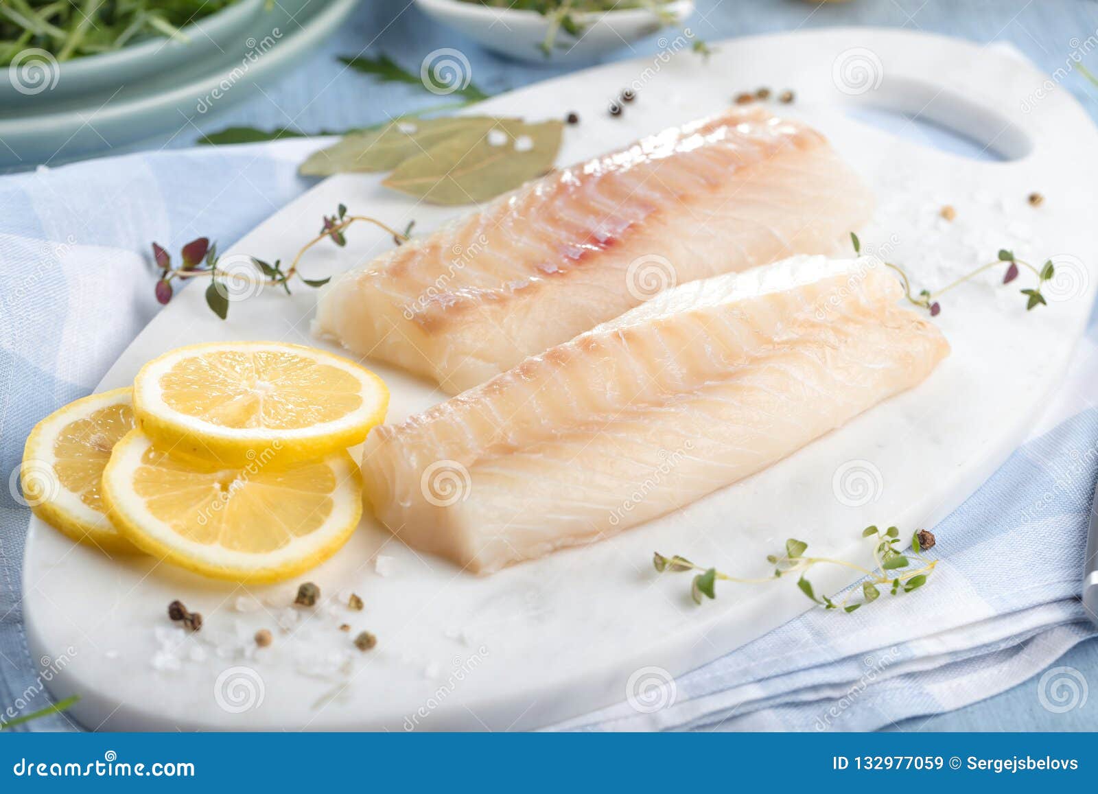 Fresh Fish, Raw Cod Fillets with Addition of Herbs and Lemon. Stock ...