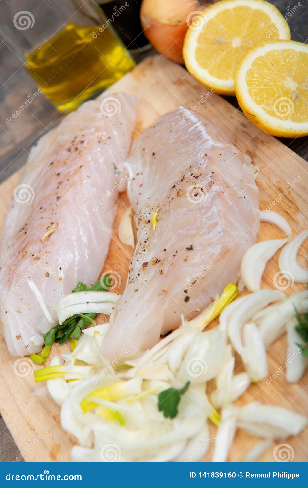 Fresh Fish, Raw Cod Fillets with Addition of Herbs and Lemon Stock ...