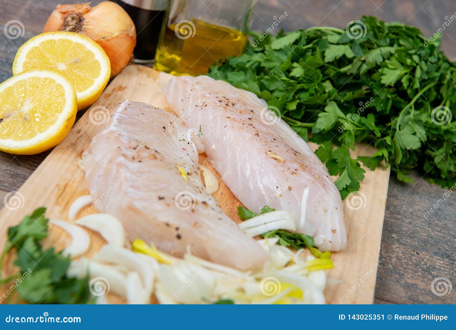 Fresh Fish, Raw Cod Fillets with Addition of Herbs and Lemon Stock ...