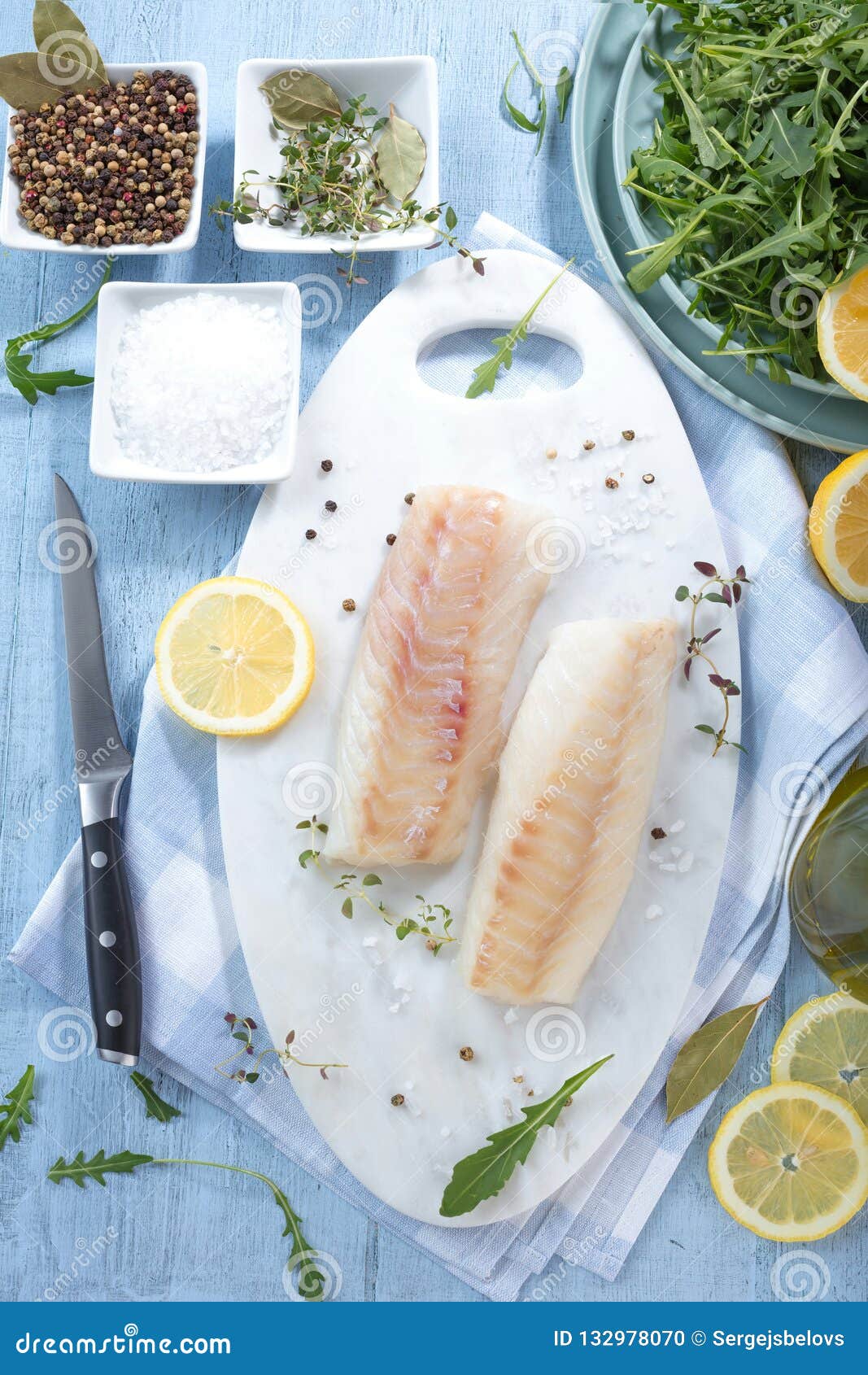 Fresh Fish, Raw Cod Fillets with Addition of Herbs and Lemon. Stock ...