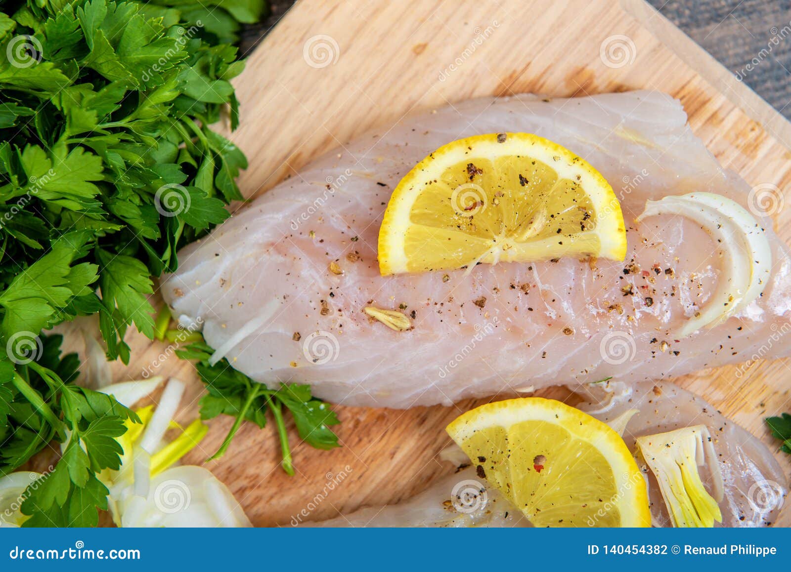 Fresh Fish, Raw Cod Fillets with Addition of Herbs and Lemon Stock ...