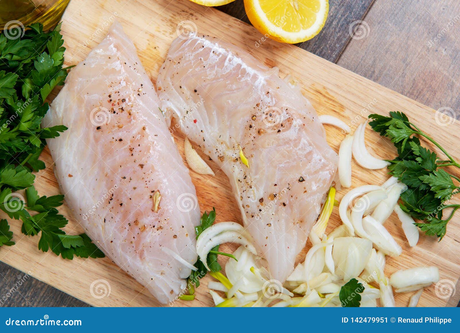 Fresh Fish, Raw Cod Fillets with Addition of Herbs and Lemon Stock ...