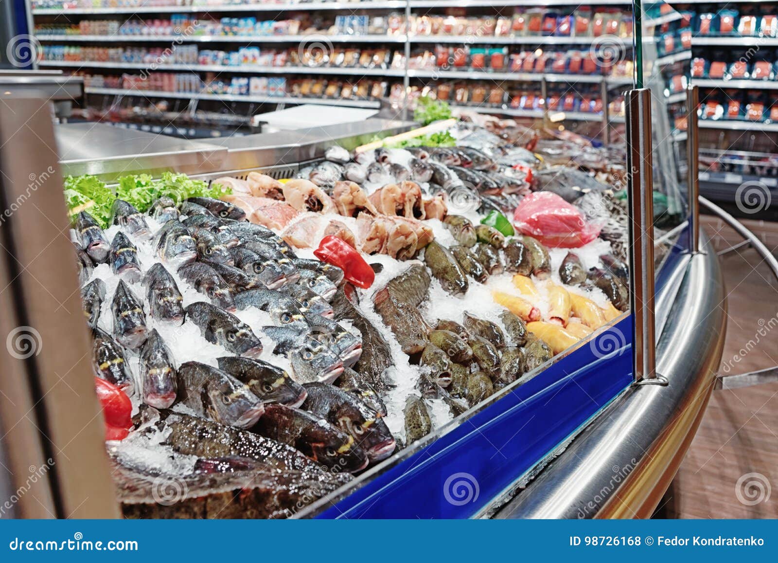 Fresh Fish and Seafood on Iced Market Display, Toned Stock Photo ...