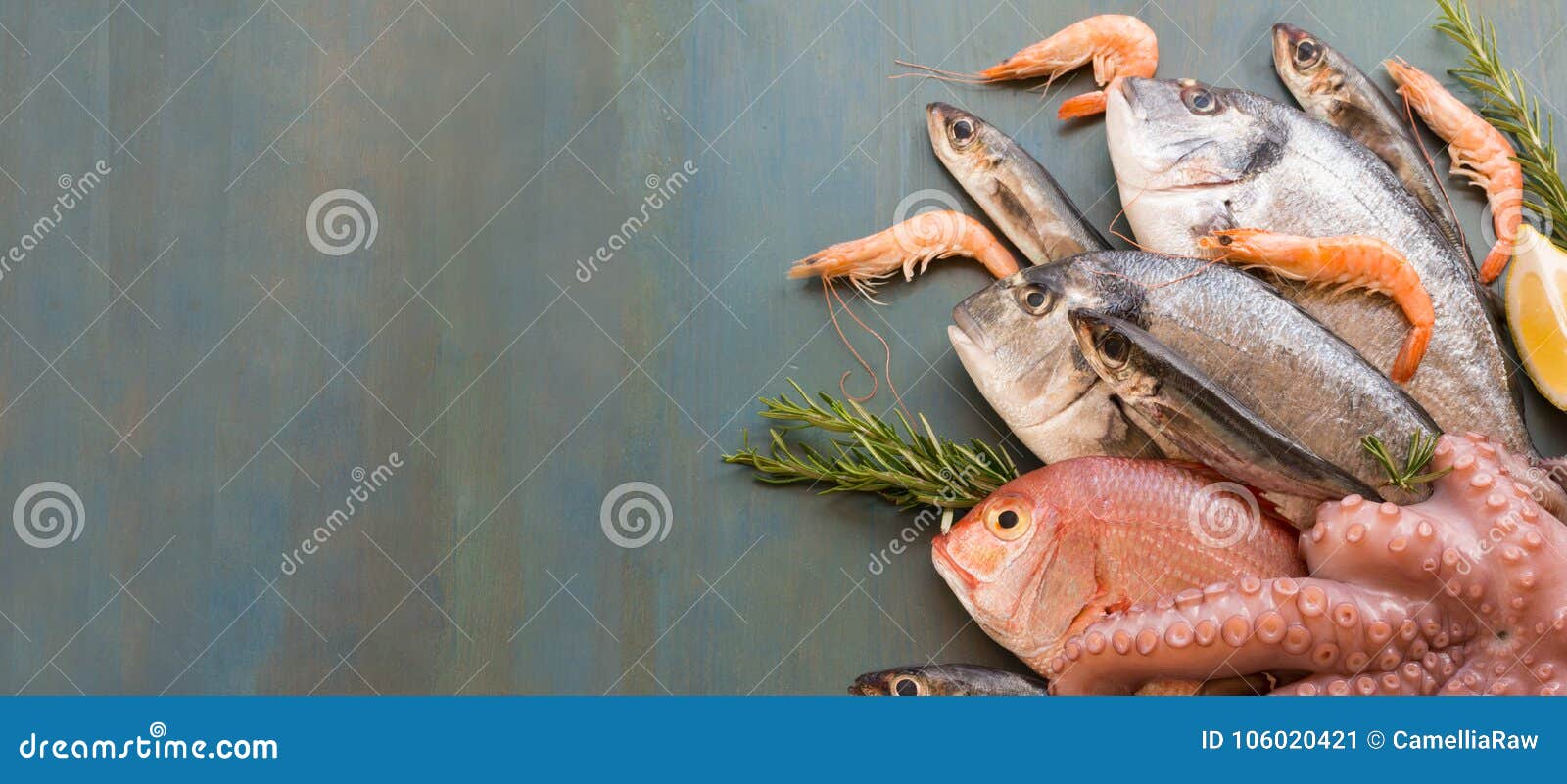 Fresh Fish and Seafood Lay on Blue Background with Copy Space. Stock ...