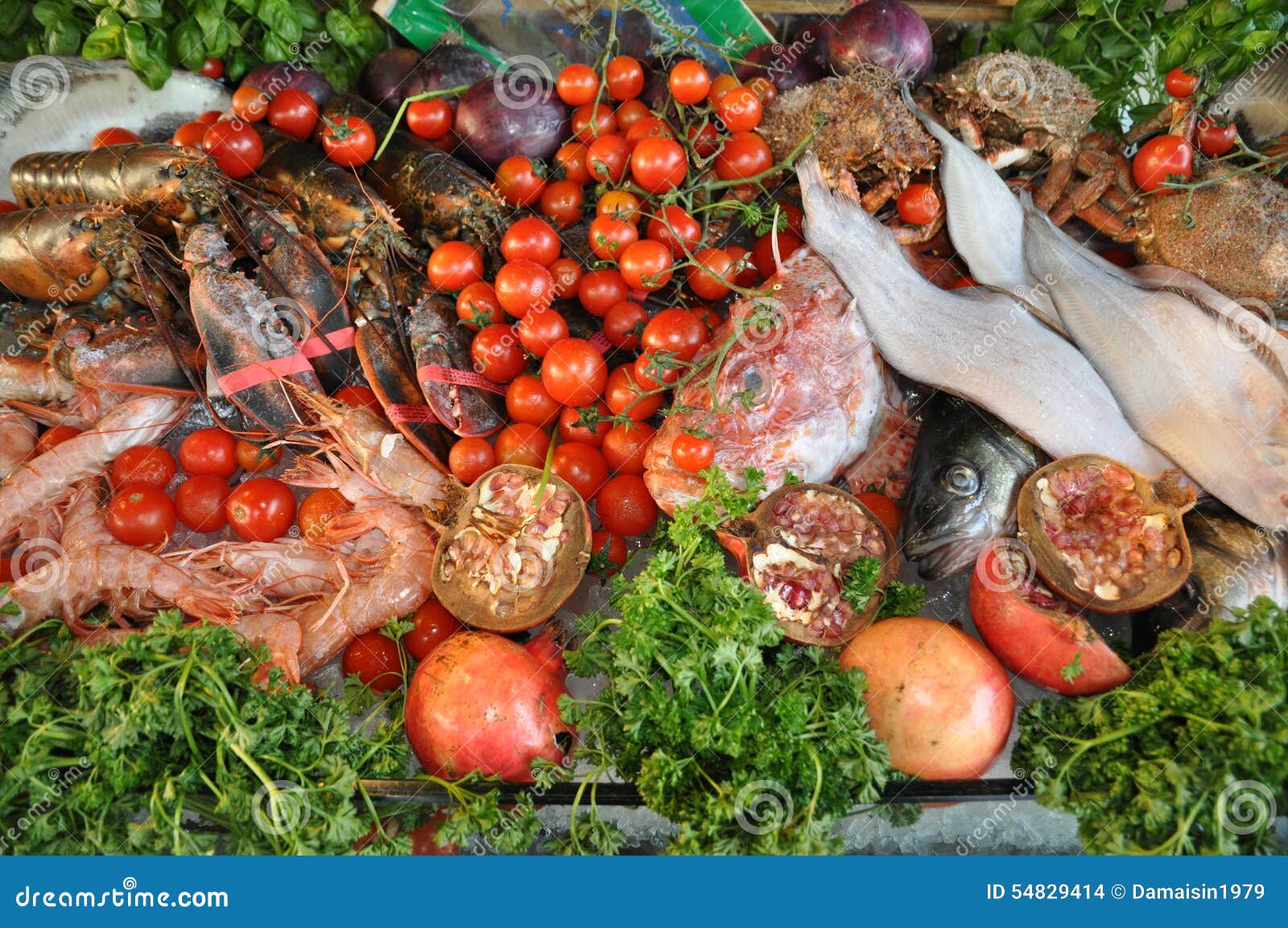 Fresh fish with vegetables stock photo. Image of tomato - 54829414