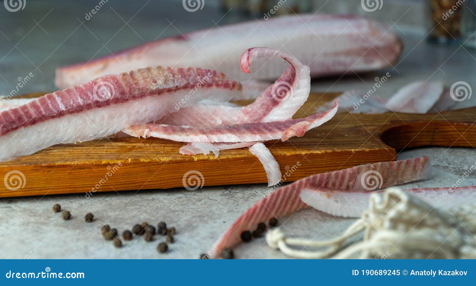 Fresh Frozen Fish Cut into Thin Slices. National Dish of Raw Frozen ...