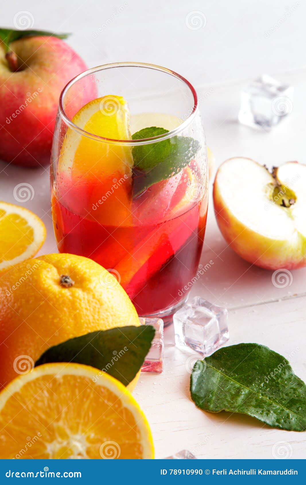 Fresh Fruit Punch with Orange and Apple Slice for Refreshment Stock ...