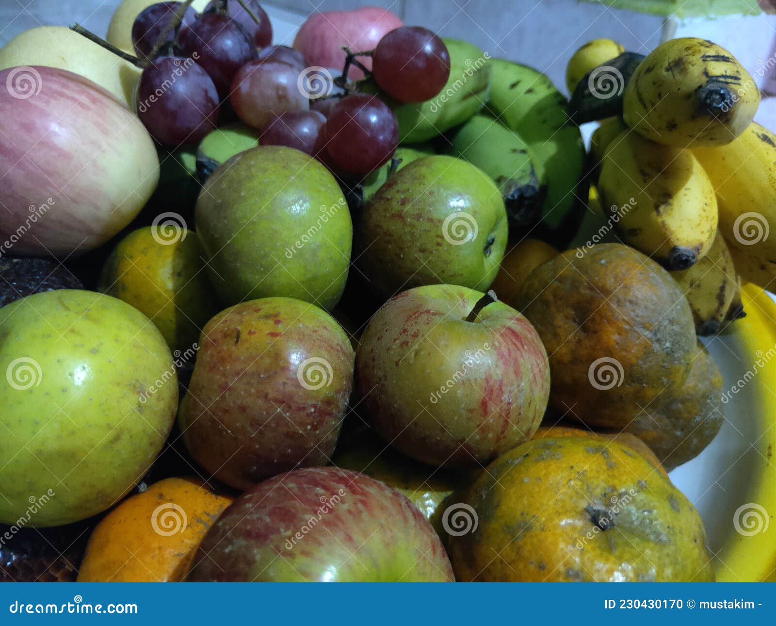 Fresh fruit on the table stock photo. Image of citrus - 230430170