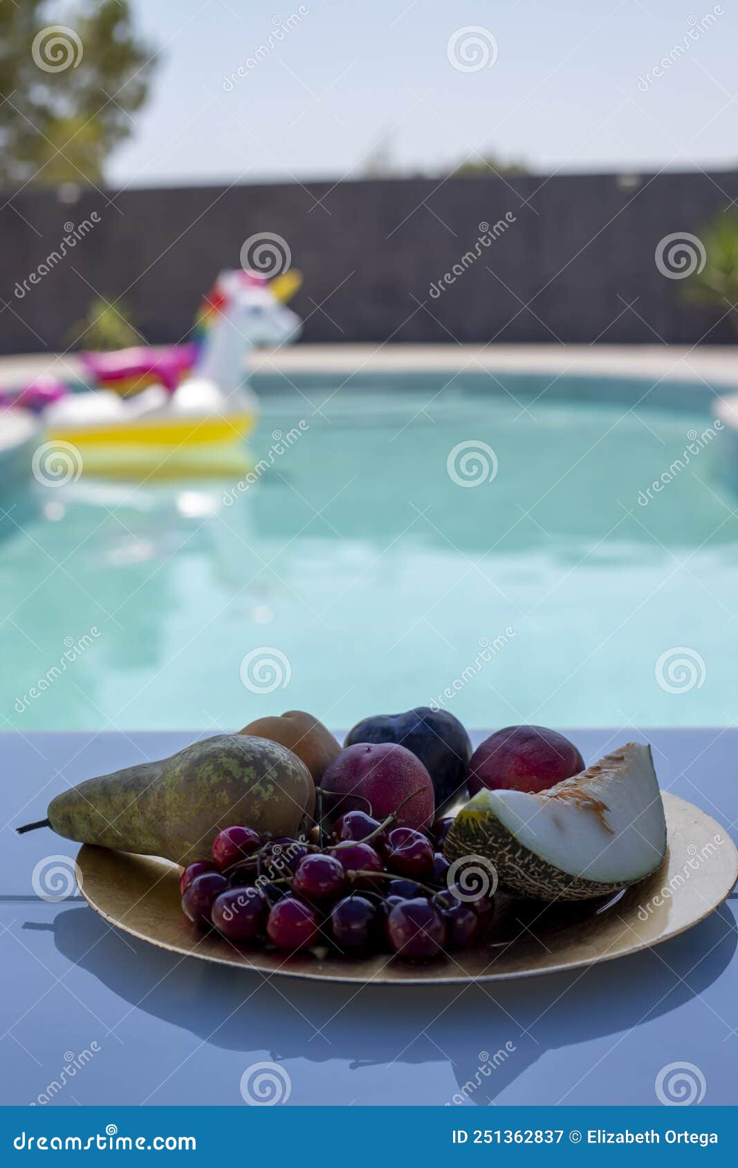 Fresh Fruit Tray Covered with Mesh for Insects, Waiting by the Pool ...
