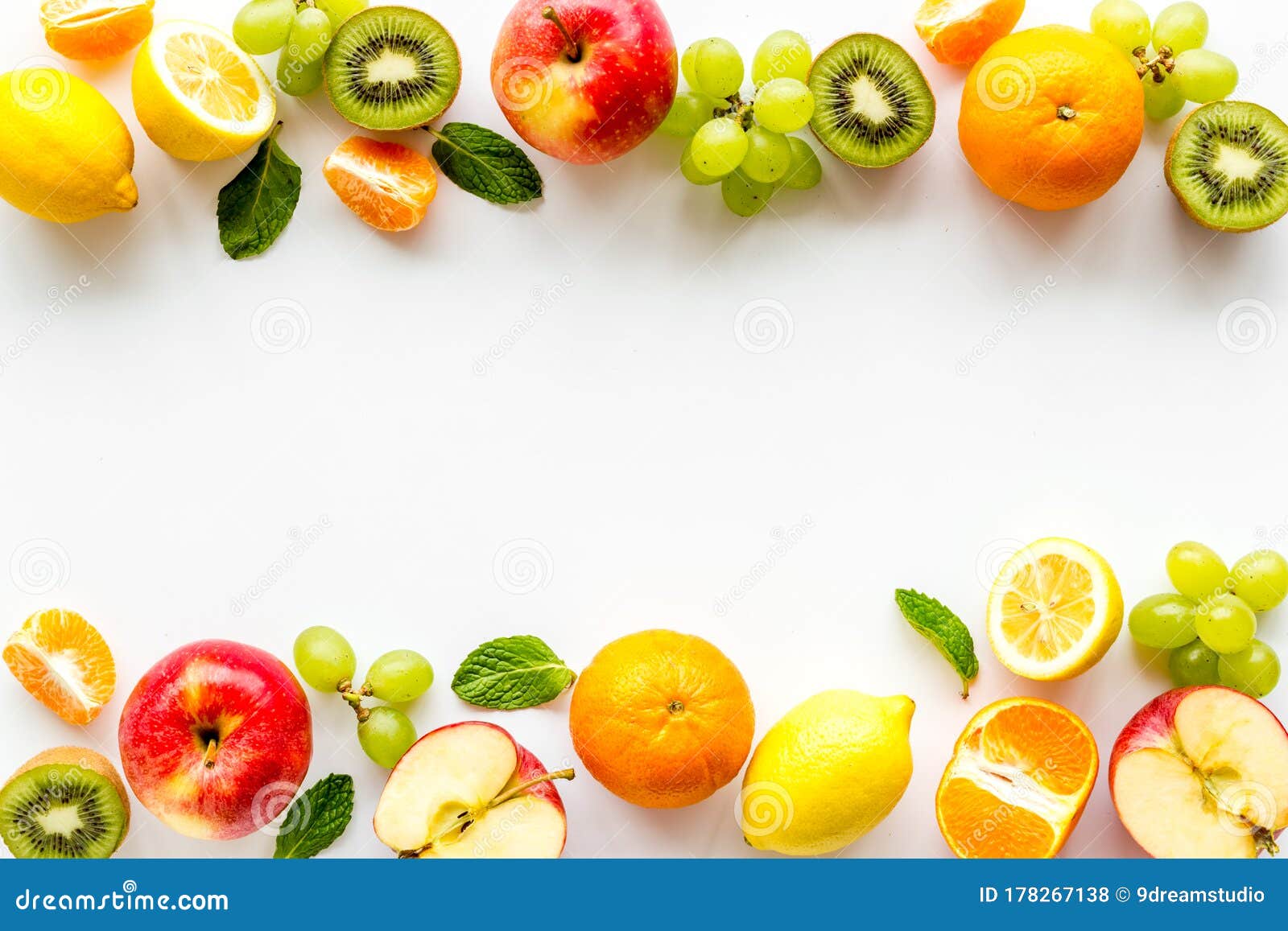 Fresh Fruits Background with Citruses, Apple, Kiwi and Grape on White ...