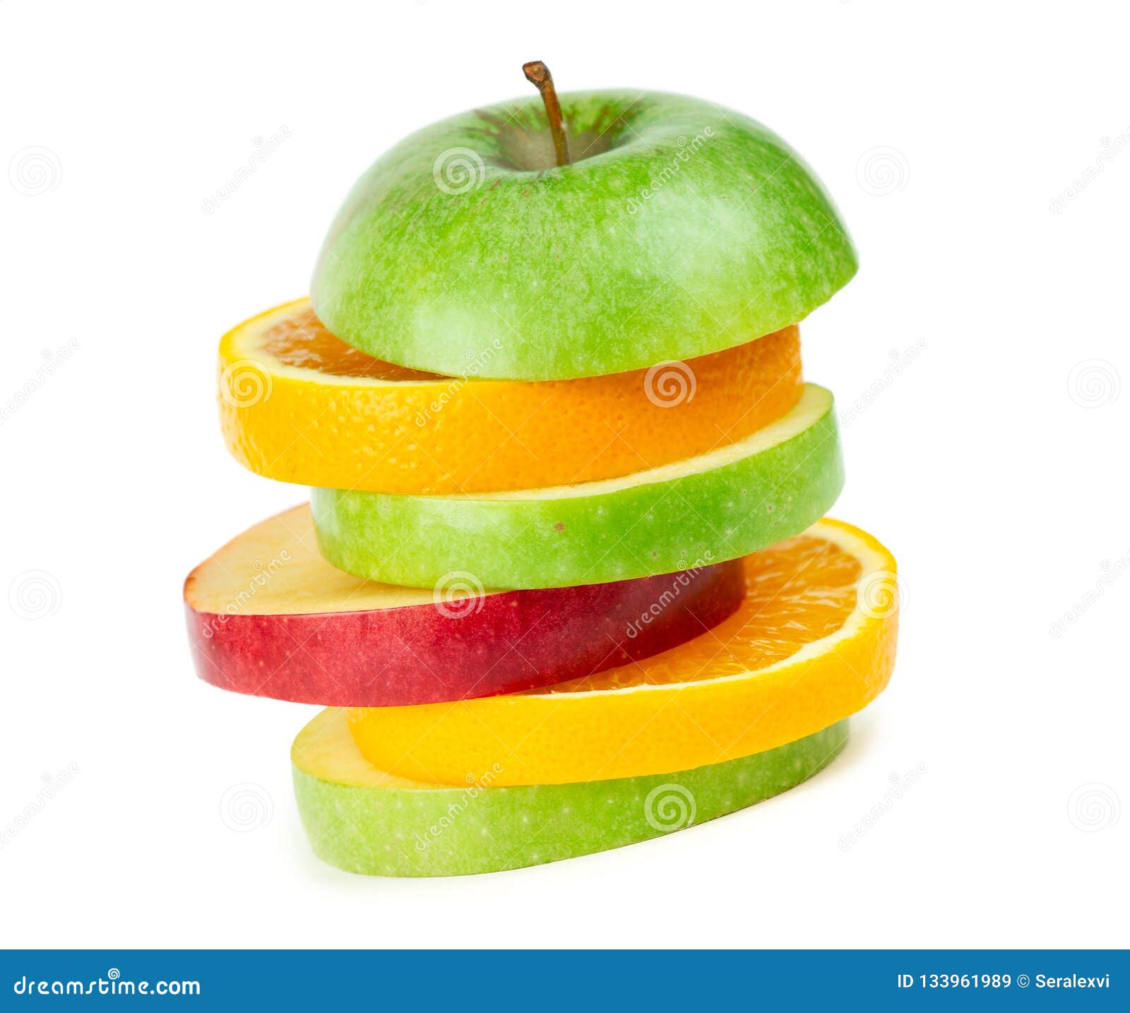 Fresh Fruits. Stack of Apple and Orange Slices on White Stock Image ...