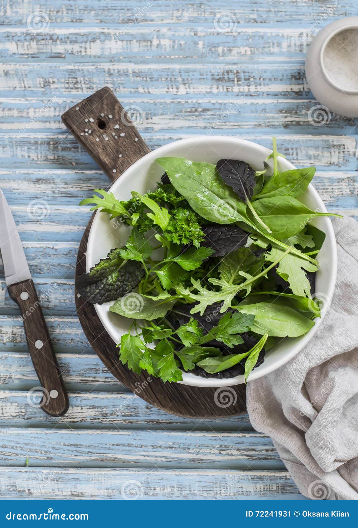 Fresh Garden Herbs on a Light Rustic Wooden Background Stock Image ...