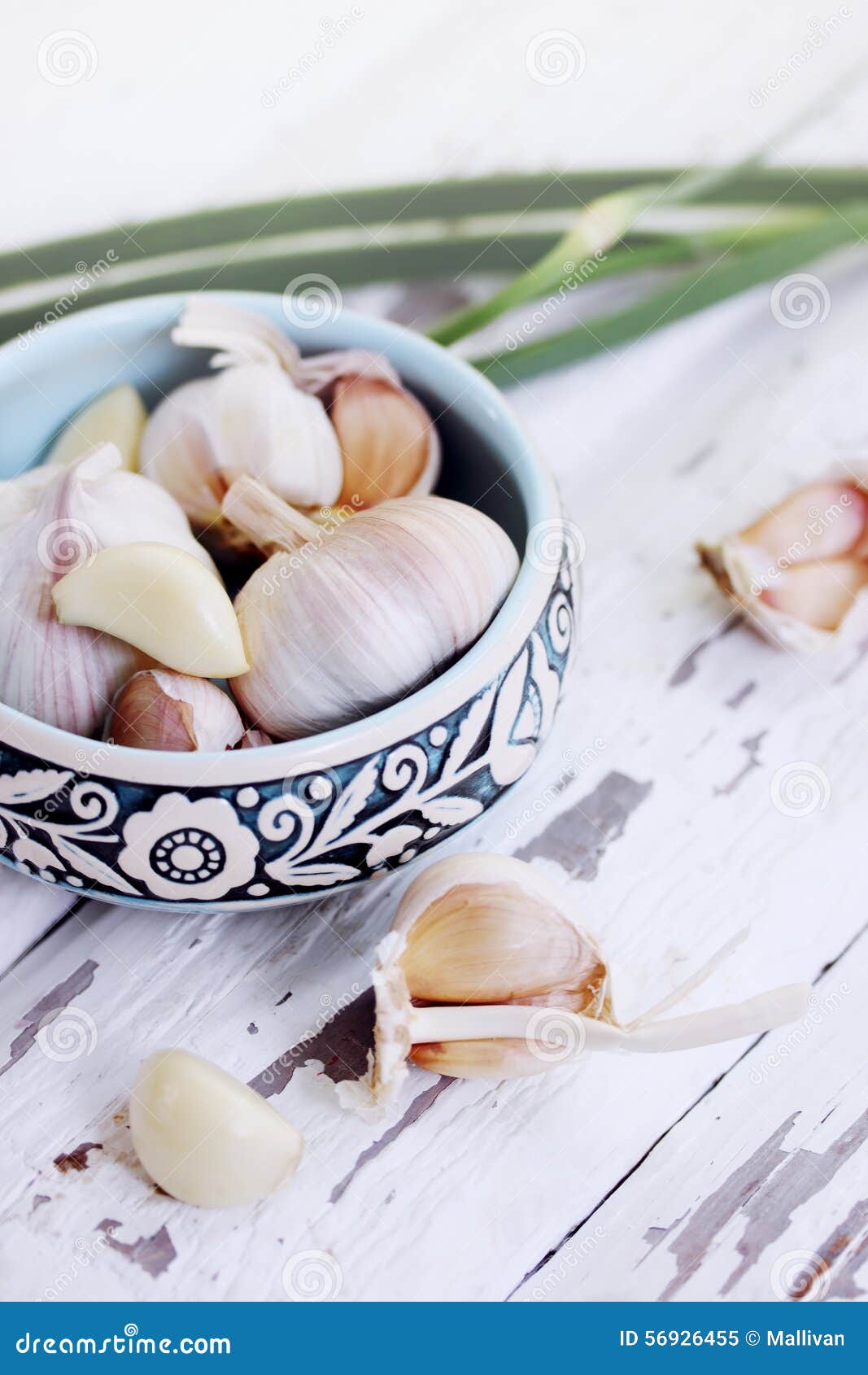 Fresh garlic in a bowl stock image. Image of lifestyle - 56926455