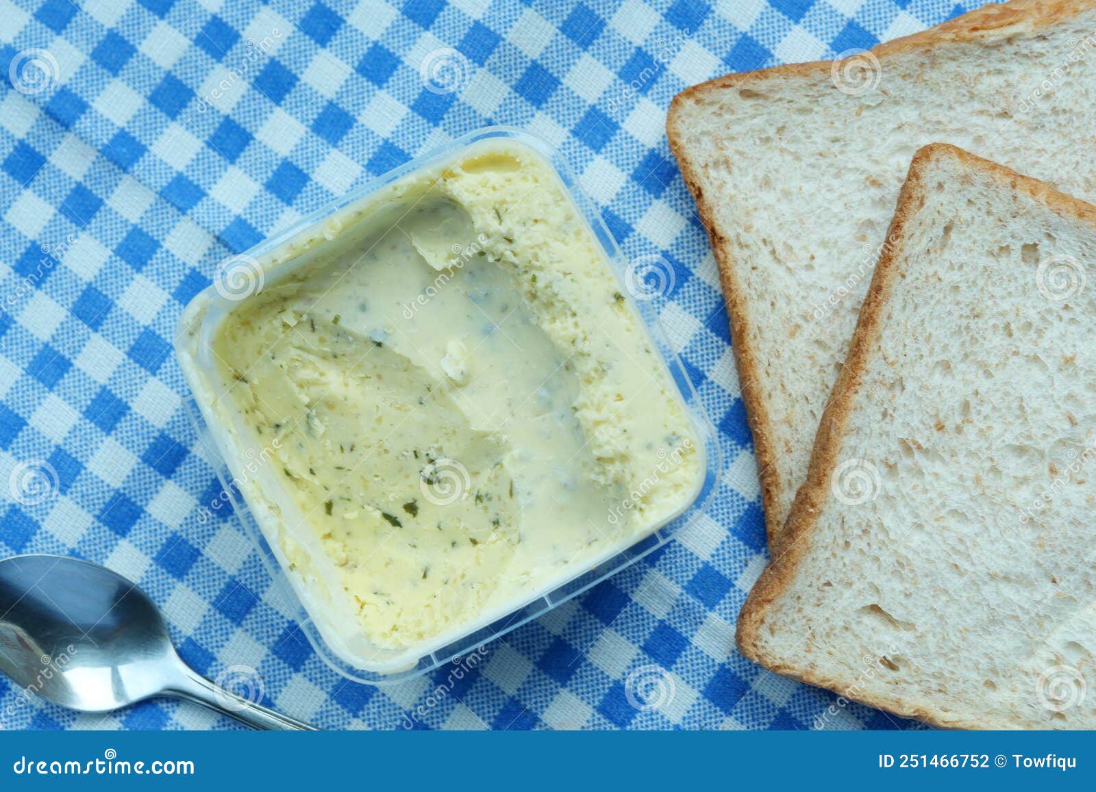 Fresh Garlic Butter in a Container with Bread on Table Stock Photo ...