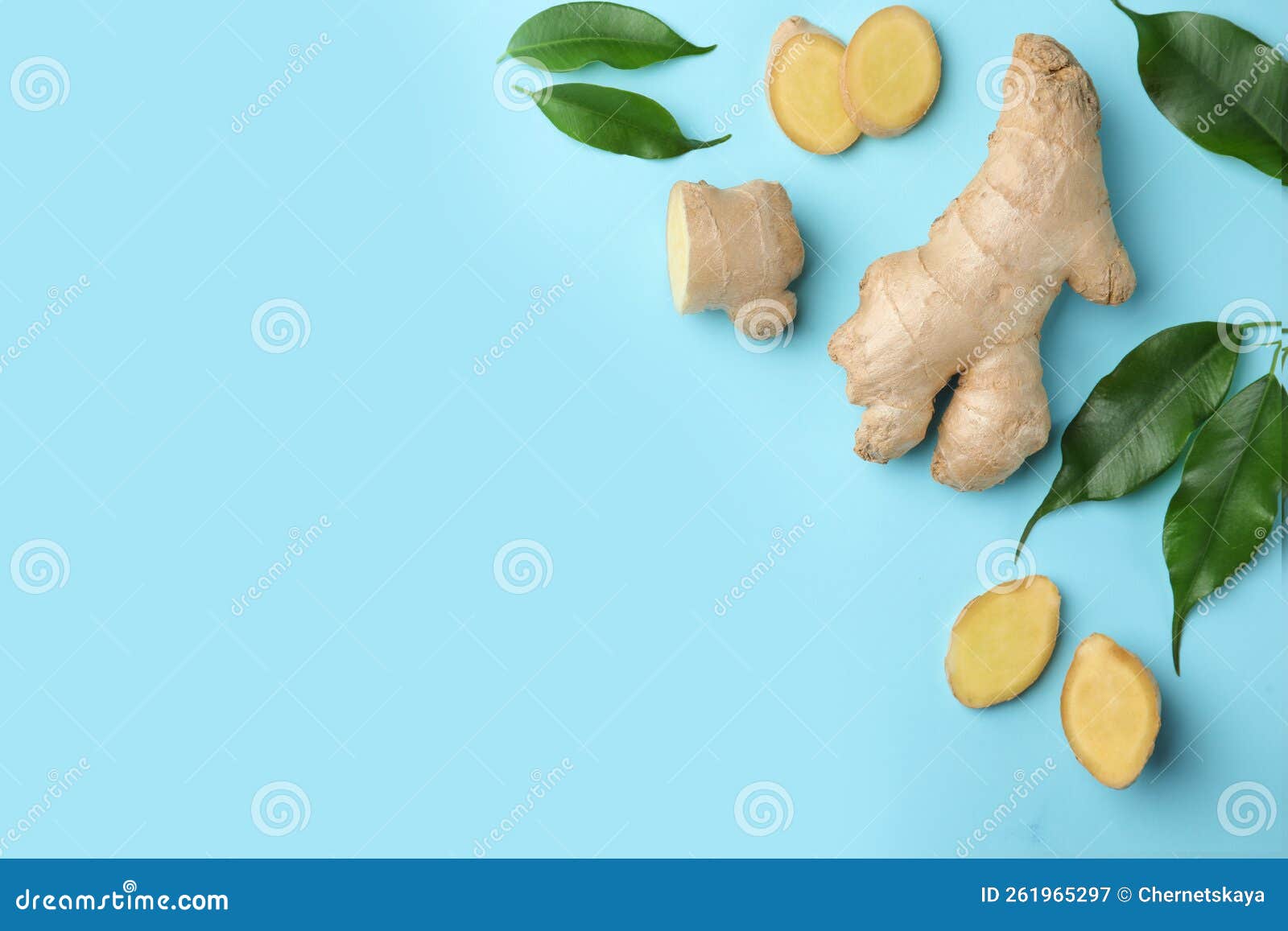 Fresh Ginger with Green Leaves on Pale Light Blue Background, Flat Lay ...