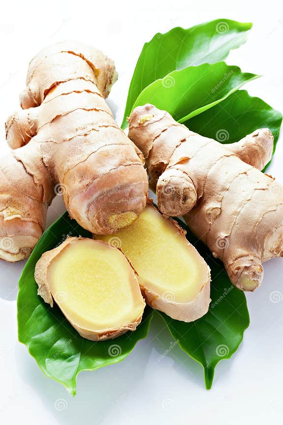 Fresh Ginger Root with Green Leaves on a White Background Stock Photo ...