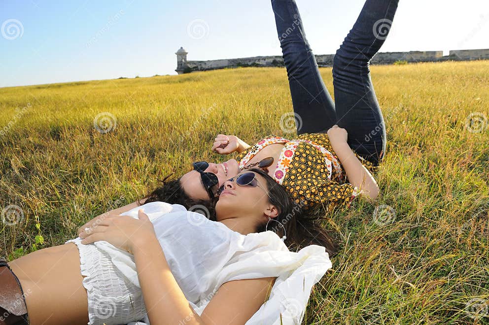 Fresh girls on the grass stock image. Image of outdoors - 11093541