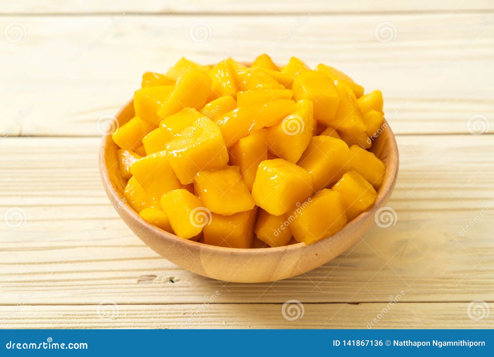 Fresh and golden mangoes stock photo. Image of sliced - 141867136