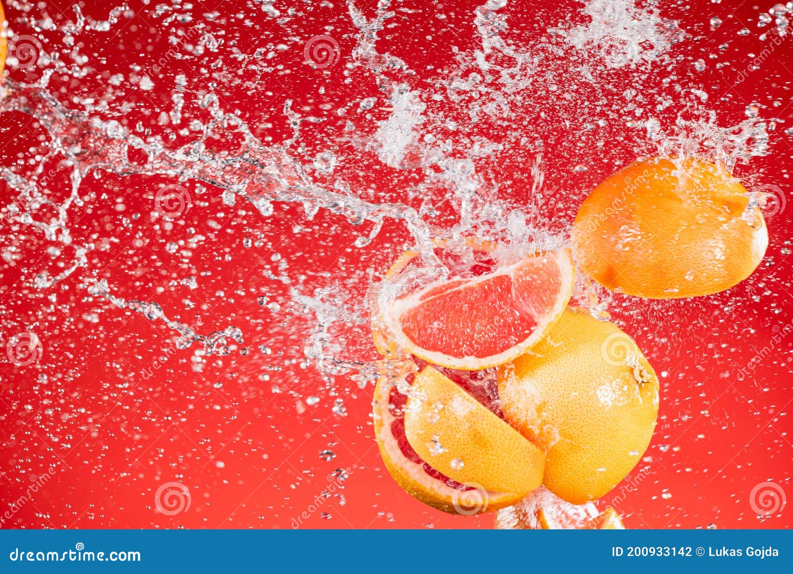 Fresh Grapefruit Slices with Water Splash Stock Photo - Image of health ...