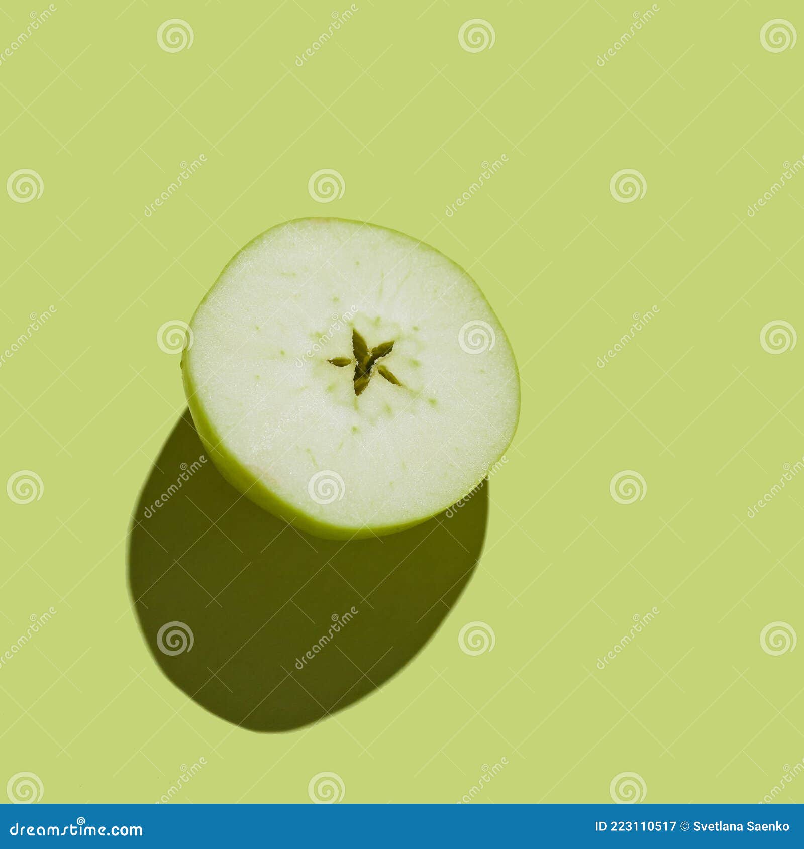 Fresh Green Cutted Apple Isolated on Green Background Stock Image ...