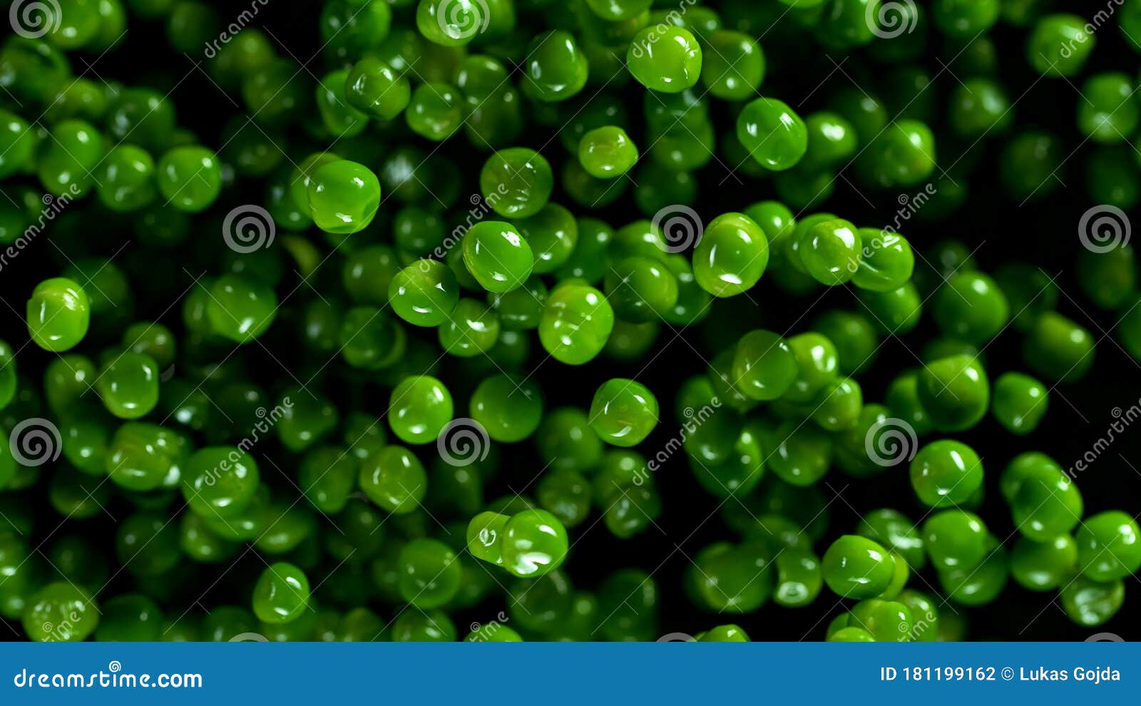 Fresh Green Peas Exploding on Black Stock Photo - Image of dinner, move ...