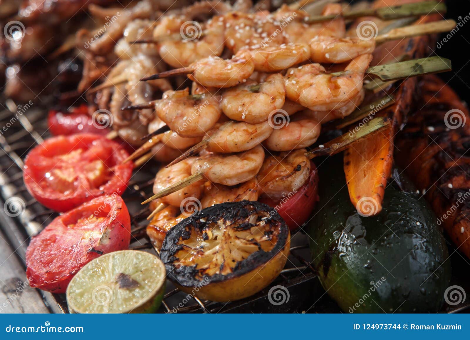 Fresh Grilled Shrimp and Octopus Kebabs with Lemon and Avocado Stock ...