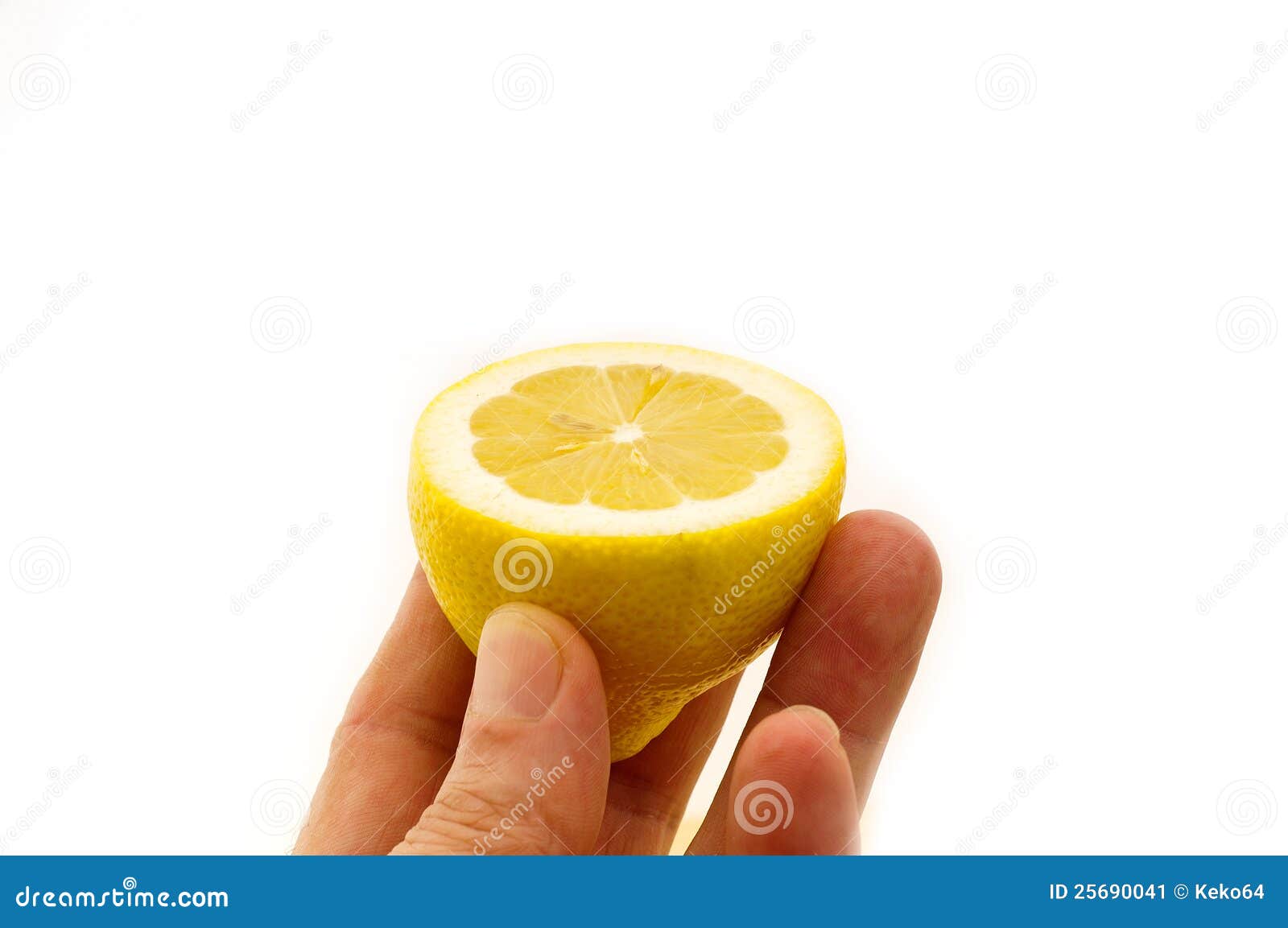 Fresh half lemon on hand stock image. Image of healthy - 25690041