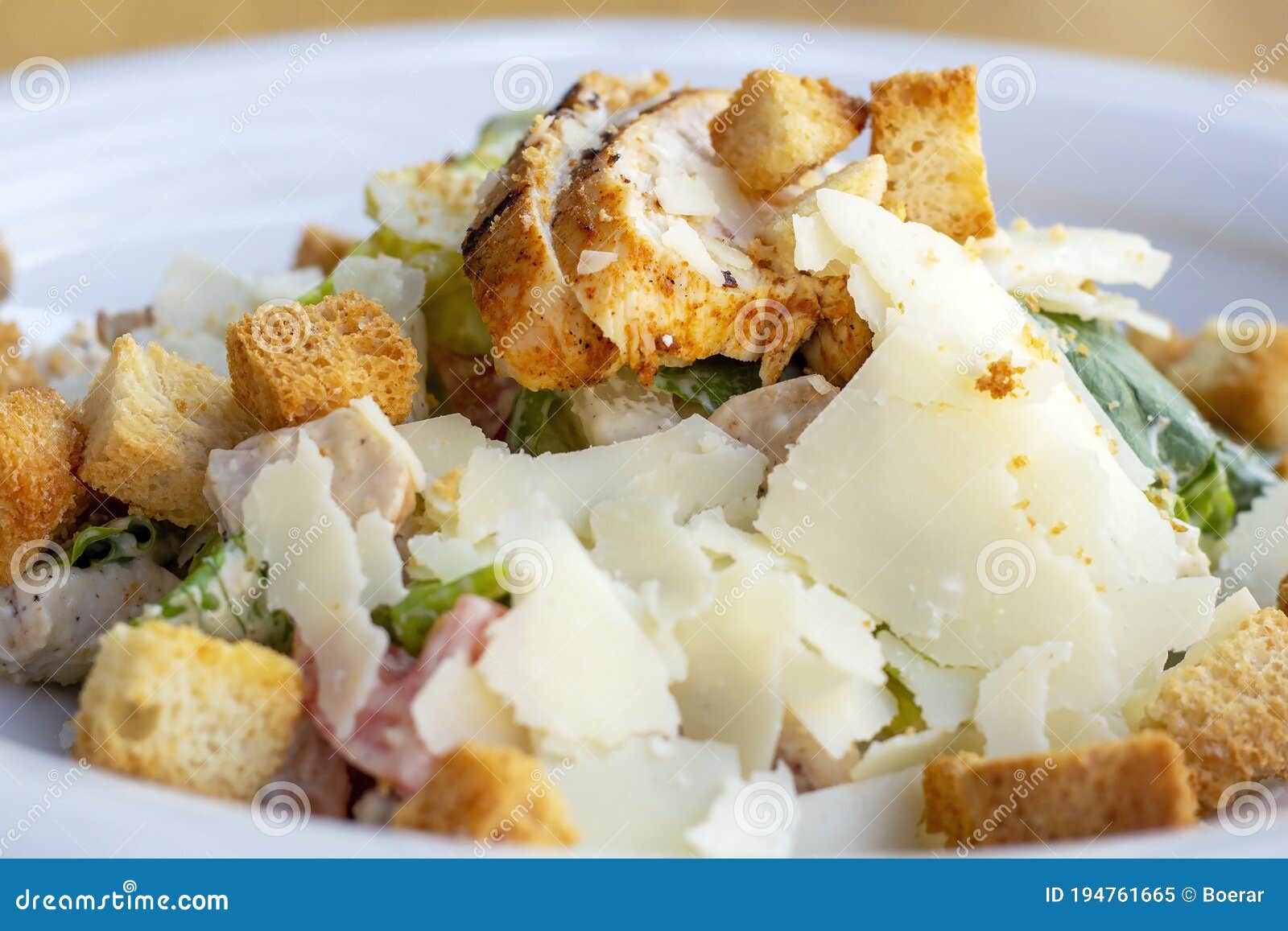 Fresh Healthy Caesar Salad with Grilled Chicken Breast in a Big White ...